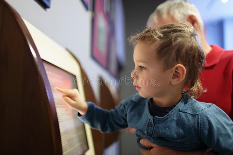 Child using touch screen stock image. Image of cute, concentration ...