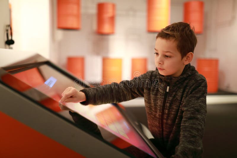 Child using touch screen stock image. Image of computer - 162524325