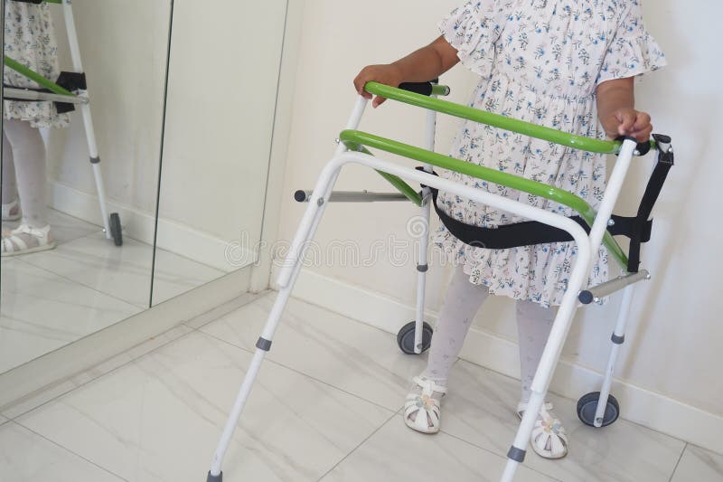 Child Using a Walker in a Bright Indoor Space Stock Image - Image of ...
