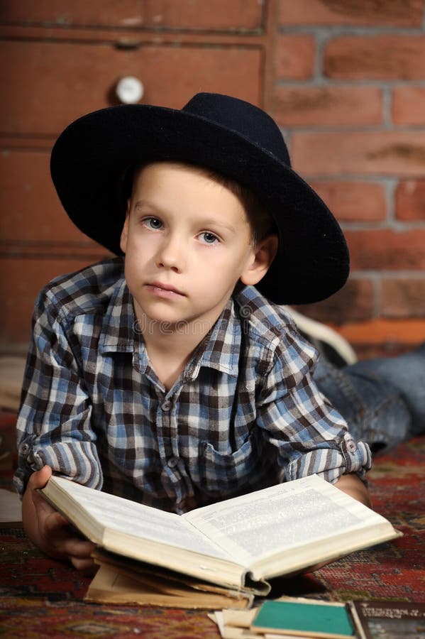 Boy with a books stock photo. Image of intellectual, dreaming - 30082534