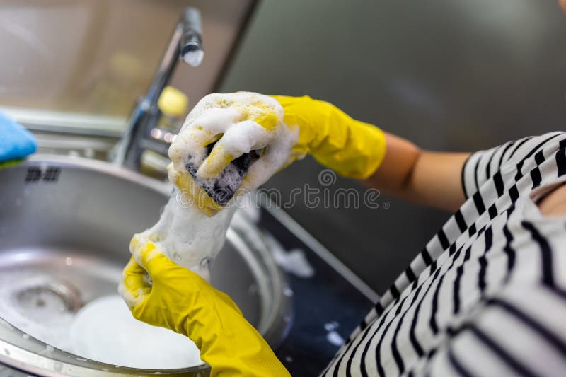Boy Washing the Dishes in the Sink and Having Fun Stock Image - Image ...