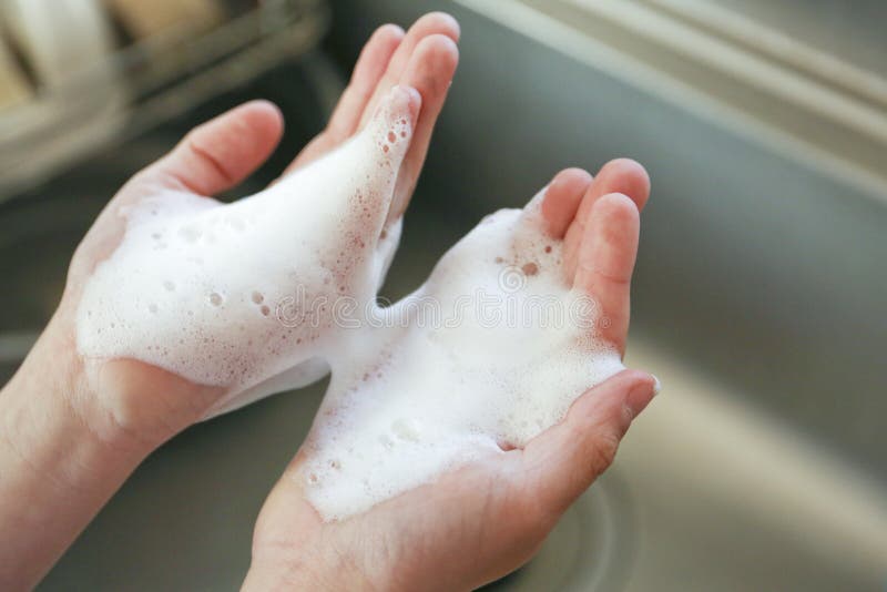 Child Washing Hands with Bubble Soup. Protecting from Bacteria and ...