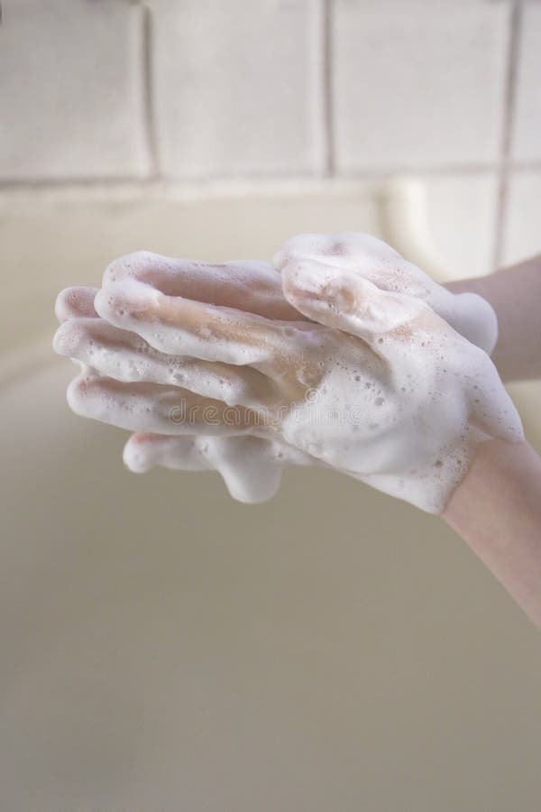 Child Washing Hands with Bubble Soup. Protecting from Bacteria and ...