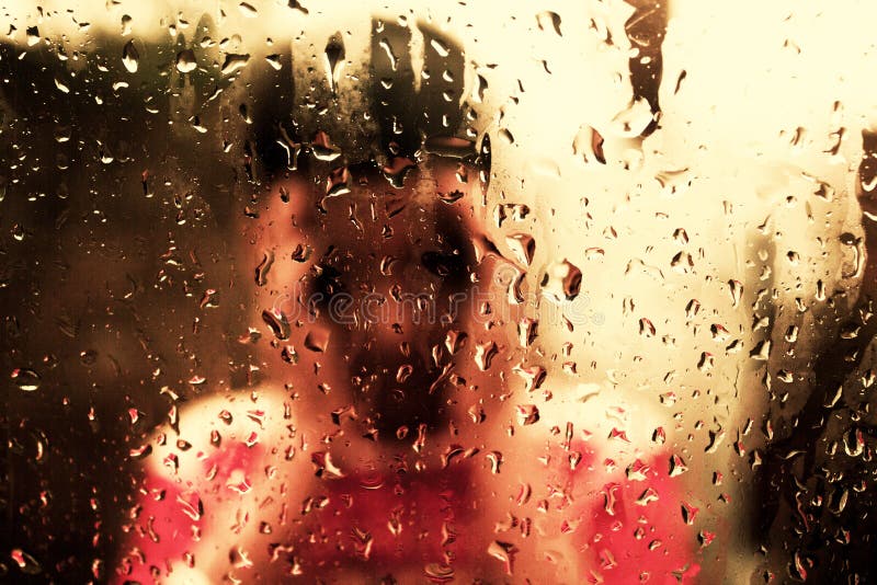 A Child is Watching Behind Glass. it is Raining. Stock Image - Image of ...