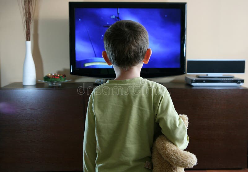 Child watching TV stock image. Image of families, sensitive - 4107827