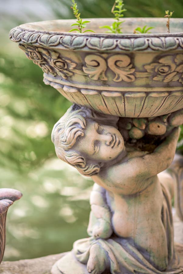 Child water basin statue stock photo. Image of christianity - 61856768