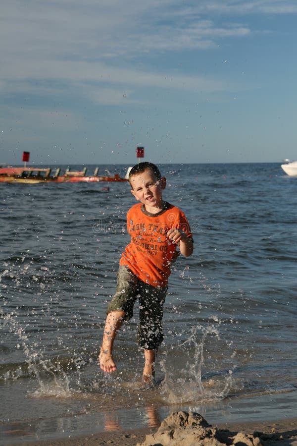 Child, Water and Fun. Beach Fun. Stock Photo - Image of laughing ...