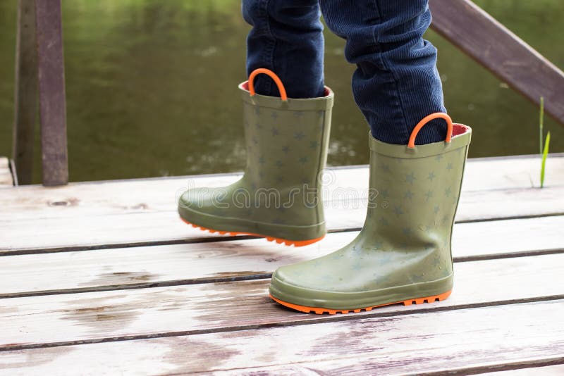 Child Wearing Rubber Boots. the Concept of Recreation and Autumn Stock ...