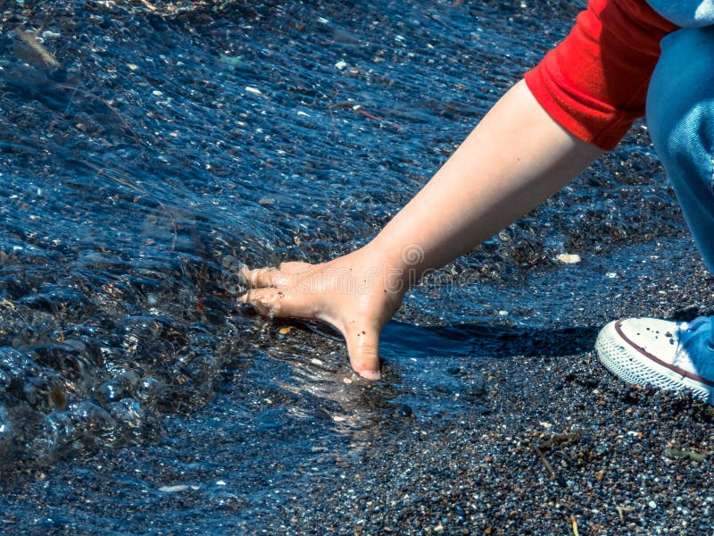 Child Who Enjoys Playing with Water Stock Photo - Image of baby, beach ...