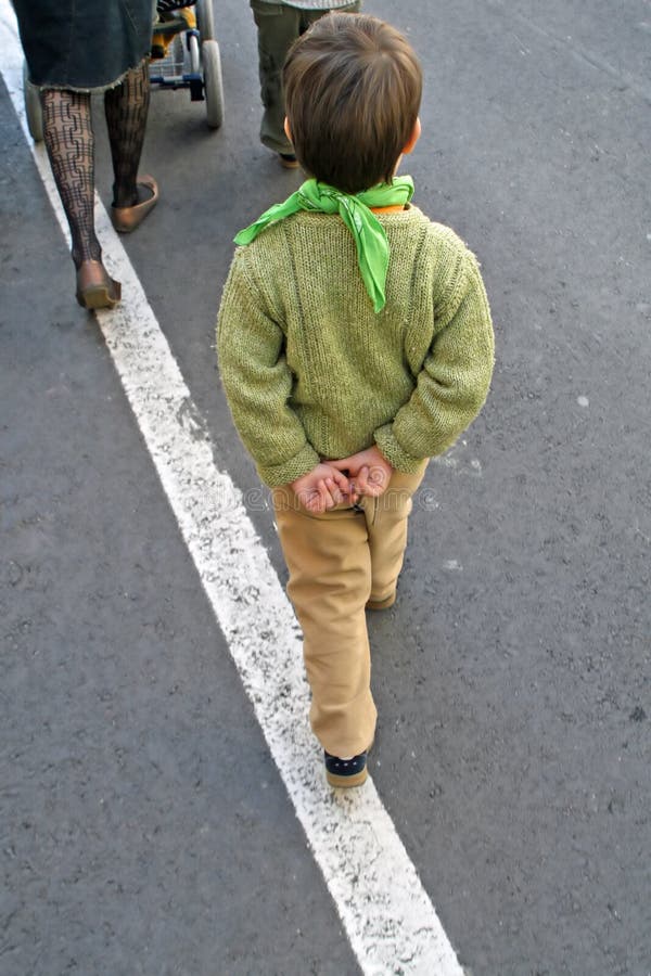 Child Who Walks with His Hands Behind His Back Stock Photo - Image of ...