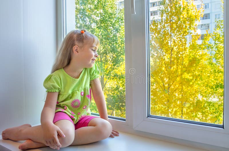 A child at the window. stock photo. Image of beauty, reflection - 26806320