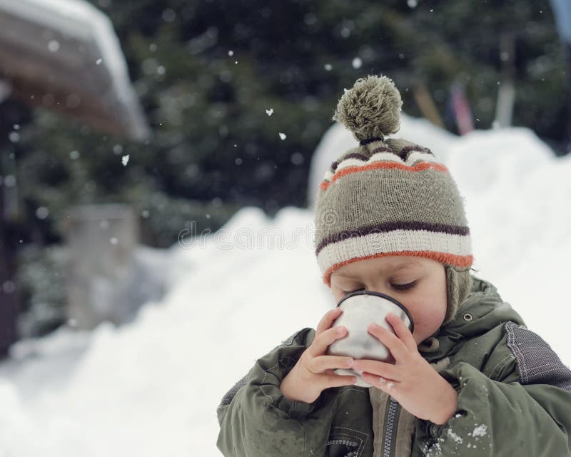 Child in Winter Drinking Hot Tea Stock Image - Image of garden, baby ...