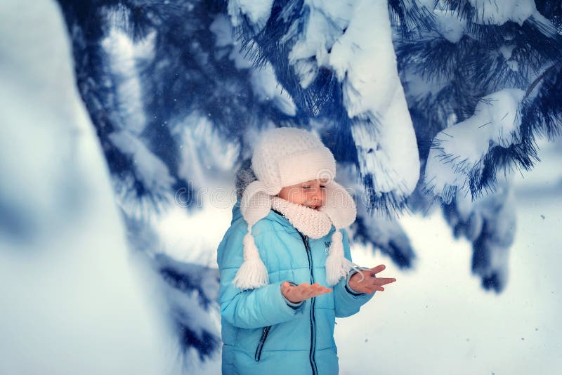 Child in the winter forest stock photo. Image of child - 48513032