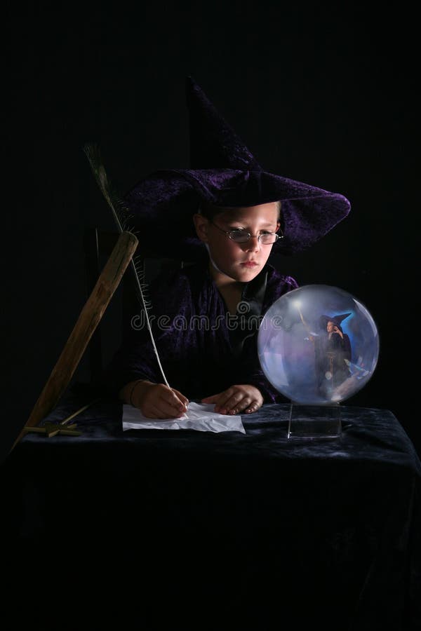 Child Wizard Writing a Spell Stock Image - Image of staff, crystal: 6325397