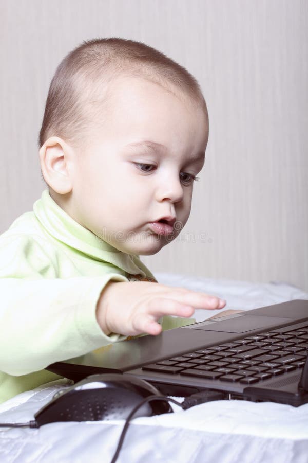Child Working at a Computer Stock Image - Image of infancy, close: 22752879