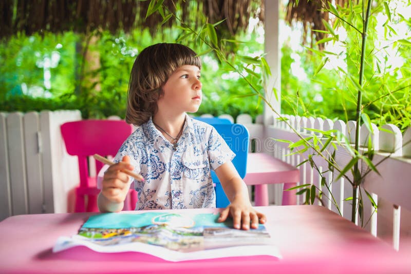 Child write in a notebook. stock image. Image of home - 63378881