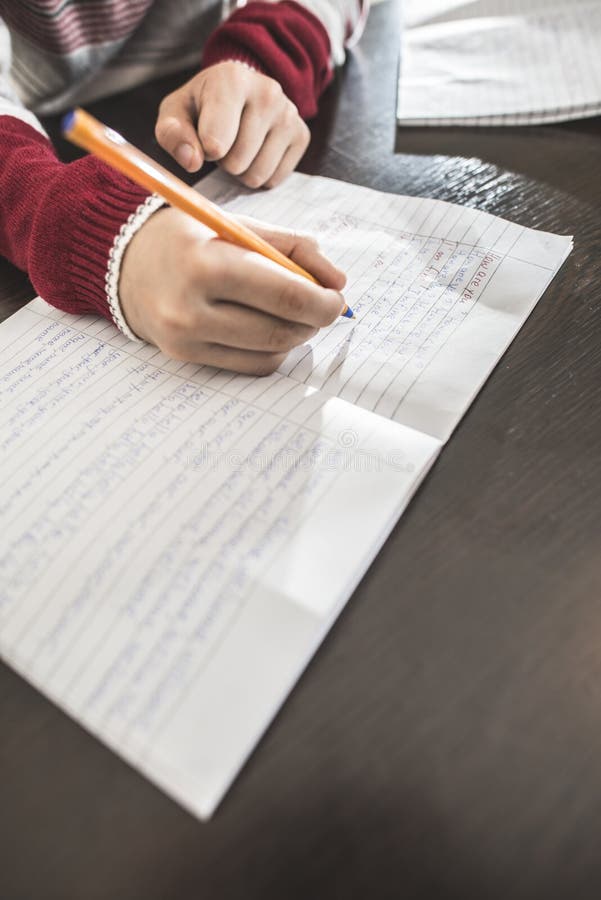 Child write in a notebook. stock image. Image of home - 63378881