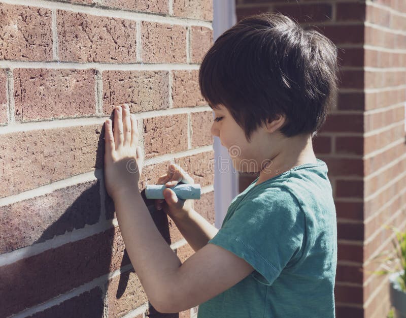 1,028 Child Writing Wall Stock Photos - Free & Royalty-Free Stock ...