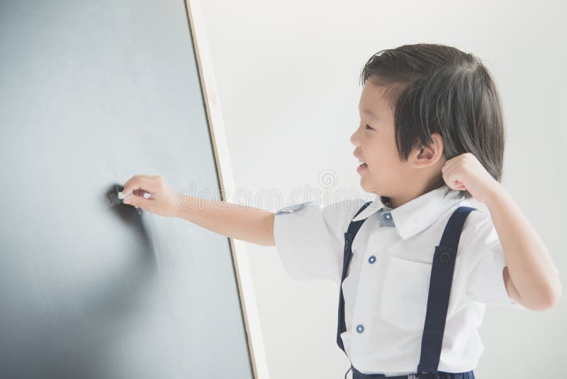 Child Writing on the Chalkboard Stock Photo - Image of confidence ...