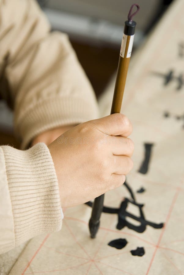 A Child Writing Chinese Calligraphy Stock Photo - Image of indoors ...