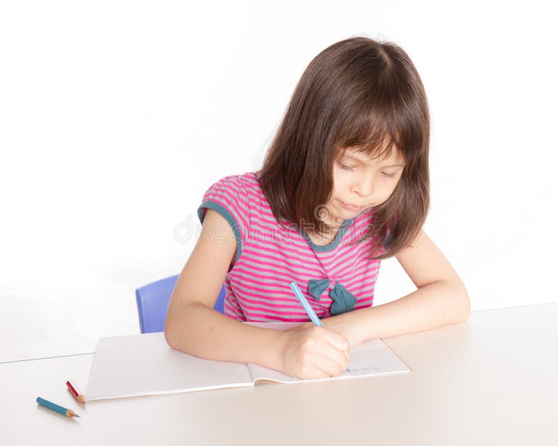 Child Writing and Thinking at Desk Stock Photo - Image of study ...