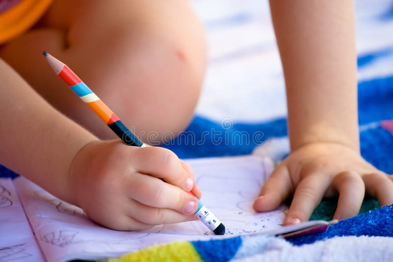 Child writing and drawing stock photo. Image of small - 3852402