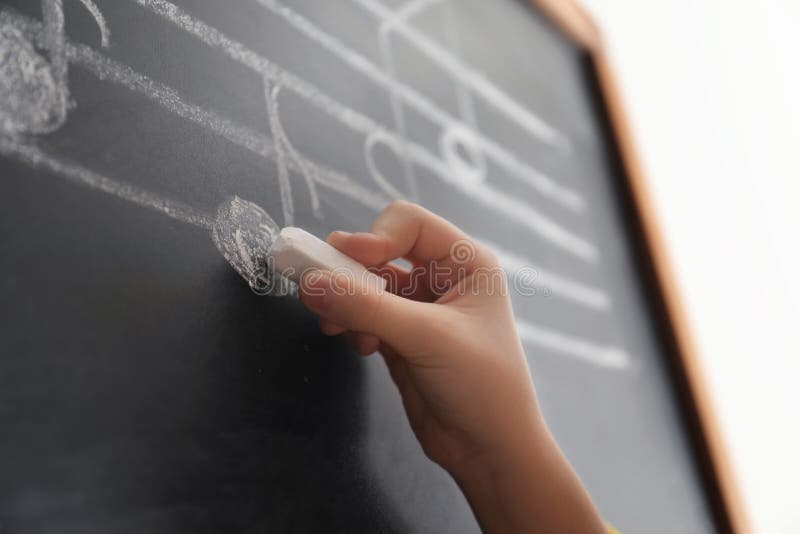 Child Writing Music Notes on Blackboard Stock Photo - Image of closeup ...