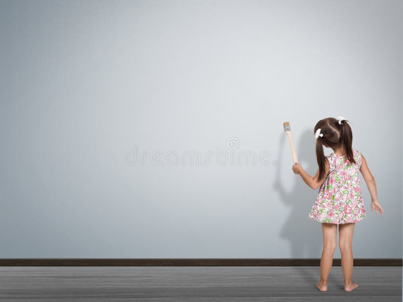 Child Writing with Paint Brush on Empty Wall, Back View Stock Image ...