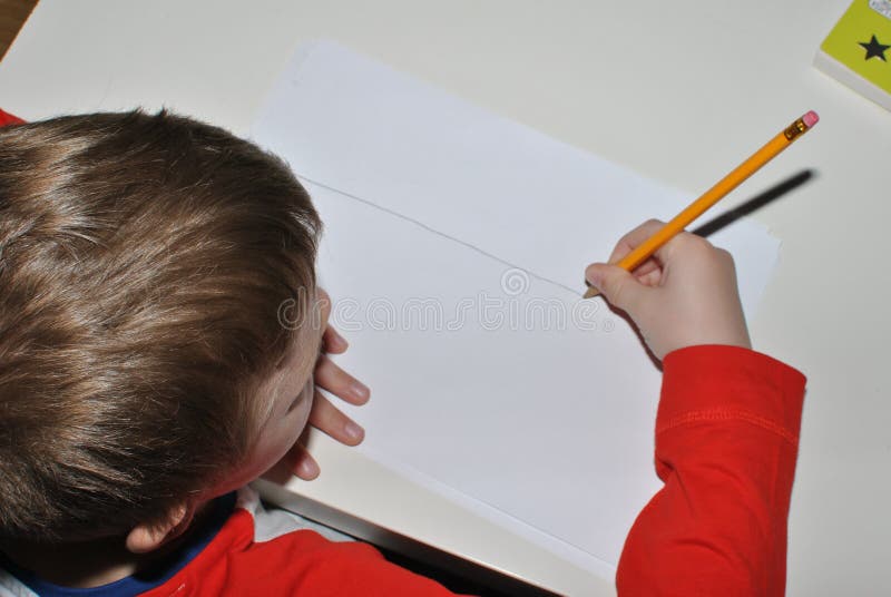 Child writing with pencil stock photo. Image of drawing - 51978418