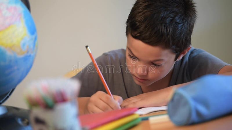 Boy, Child and Writing in Classroom with Counting, Problem Solving or ...