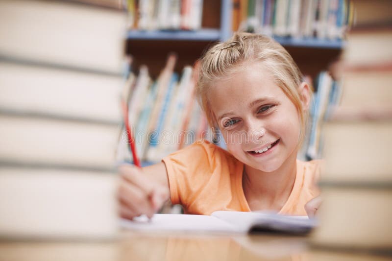 Child, Writing and Smile in Library for Education, Knowledge and Happy ...
