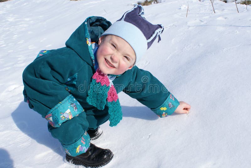 The Child Wrote in the Snow Stock Image - Image of person, smiling ...