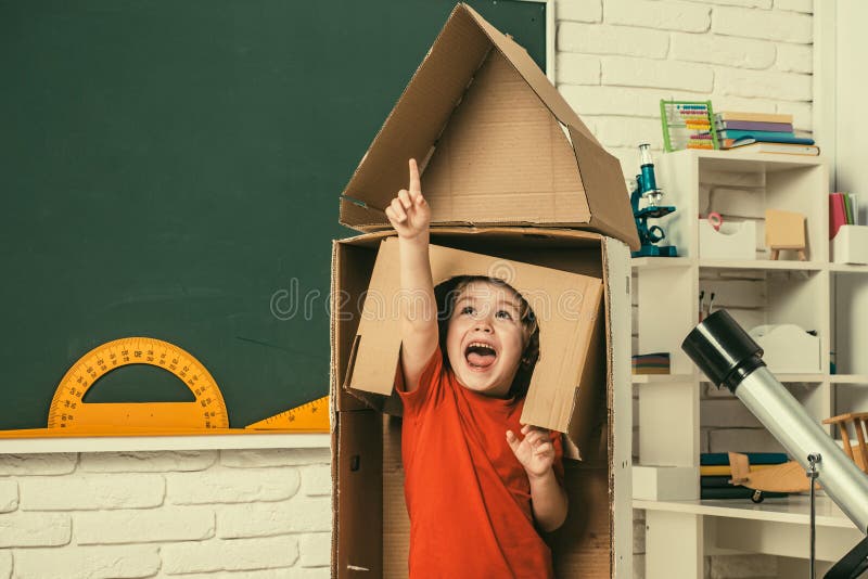 Childhood Dreams of Future. Child is Dressed in an Astronaut Costume ...