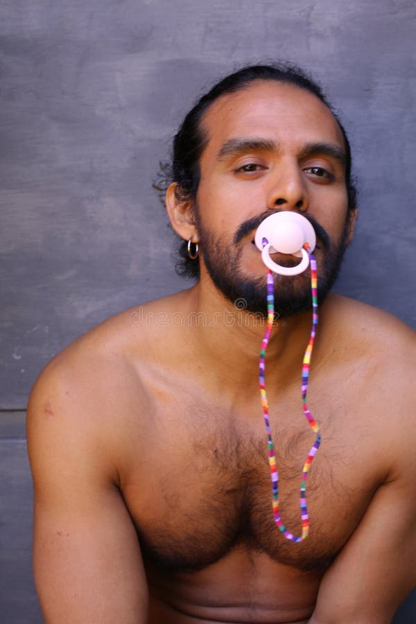 Childish Adult Using a Pacifier Stock Image - Image of bedtime ...