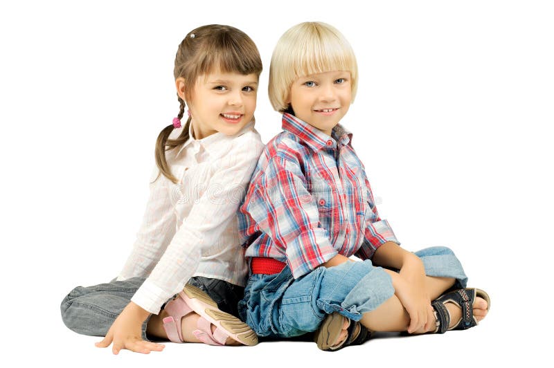 Portrait of a Two Little Girls Sitting Back To Back and Smiling Stock ...