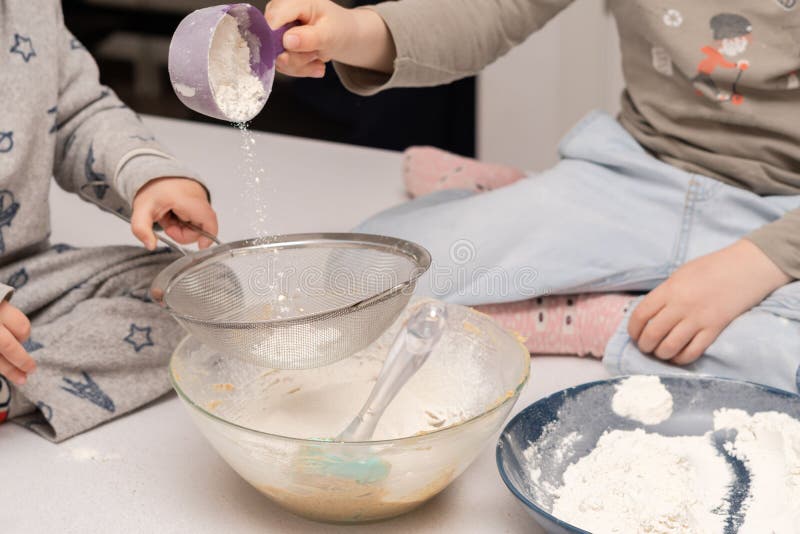 Children Adding Flour To a Cake Mixture Stock Photo - Image of cake ...