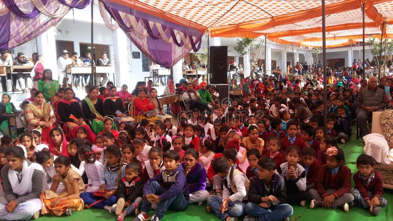 Children with Adult Sitting in the Public Function Editorial ...