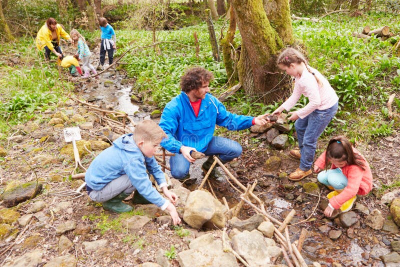 Children and Adults Carrying Out Conservation Work on Stream Stock ...