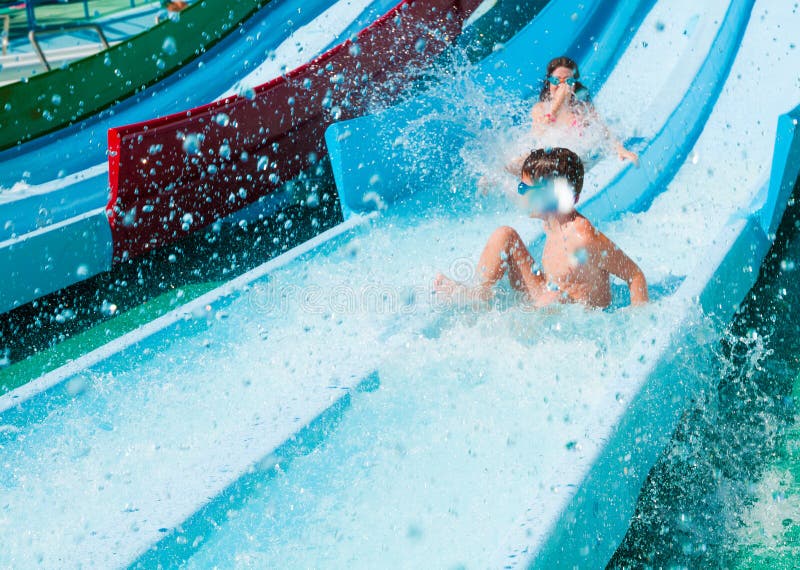 Children in aqua park stock photo. Image of pool, slide - 76735504