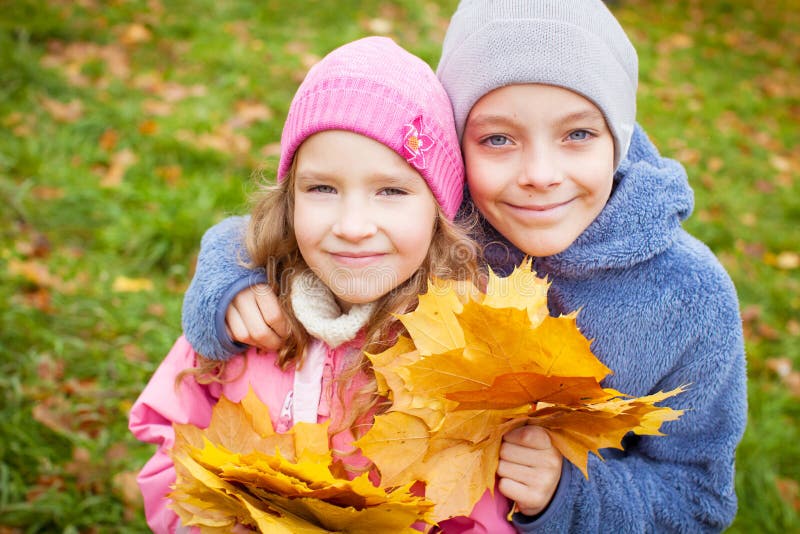 Children at autumn stock photo. Image of brown, babies - 155105580