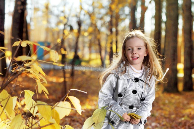 Children in autumn park stock photo. Image of cute, park - 32000140