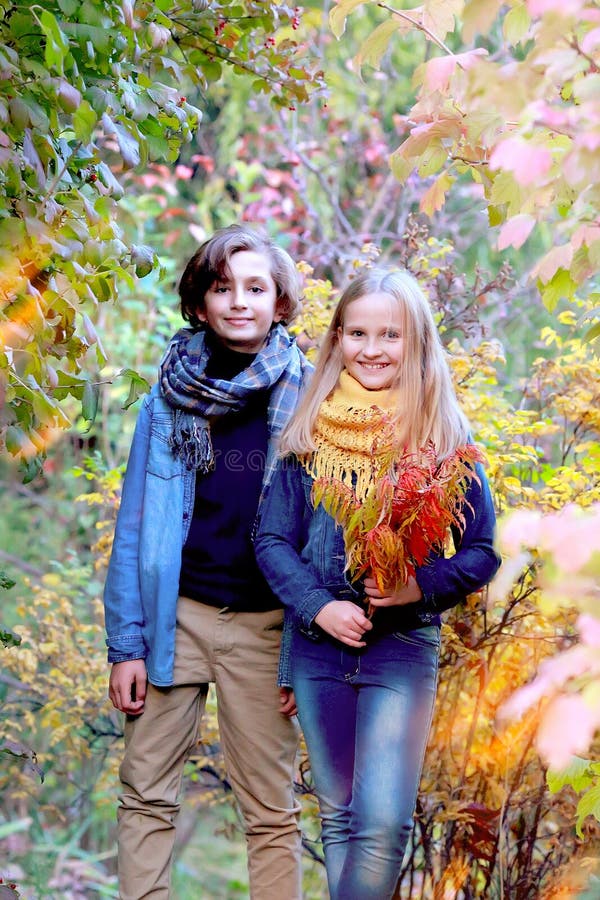 Children in the Autumn Park Walk and Have Fun Stock Image - Image of ...