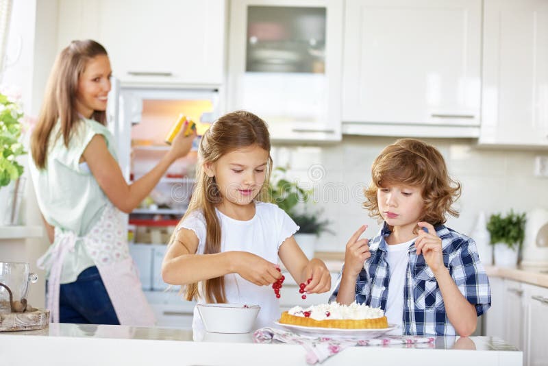 Children Bake Cakes with Mother Stock Photo - Image of healthy, kids ...