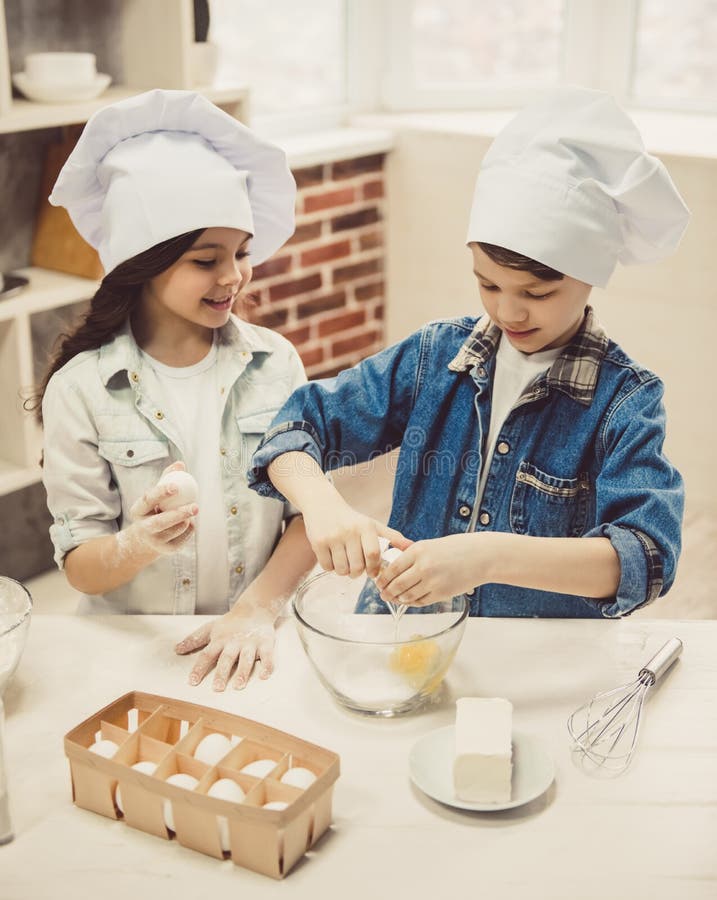 Children baking in kitchen stock photo. Image of little - 90302910
