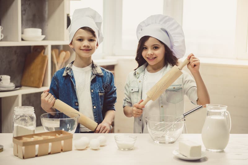 Children baking in kitchen stock photo. Image of brother - 90302114