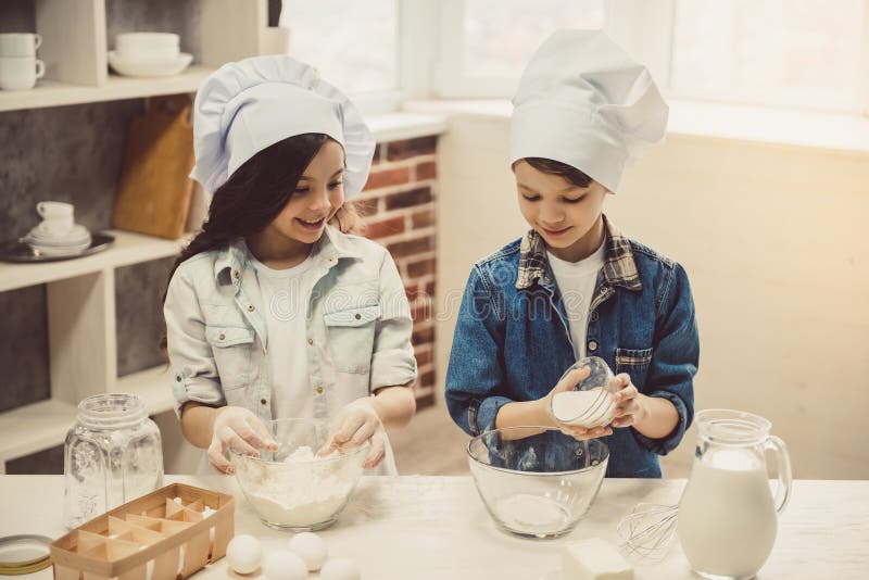 Children baking in kitchen stock photo. Image of eggs - 90302420