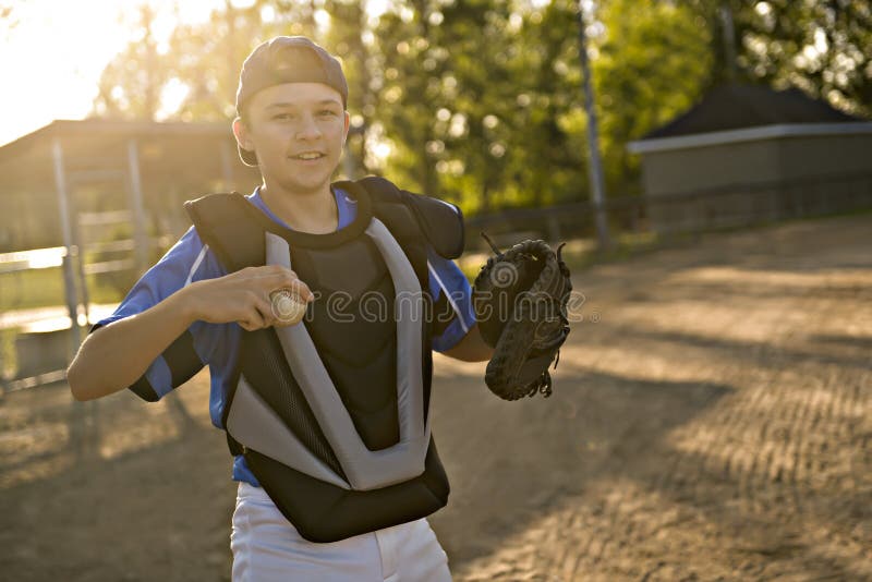 A Children Baseball Catcher Players Standing on the Playground Stock ...