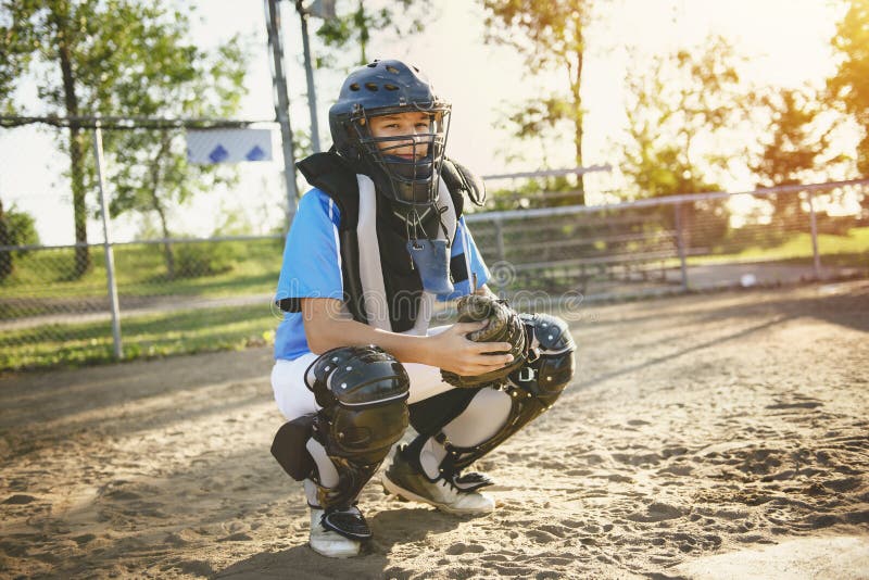 A Children Baseball Catcher Players Standing on the Playground Stock ...