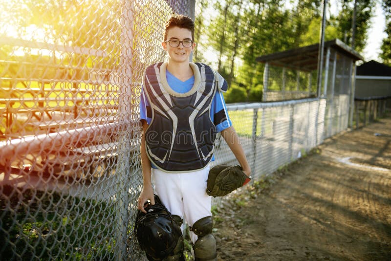 A Children Baseball Catcher Players Standing on the Playground Stock ...