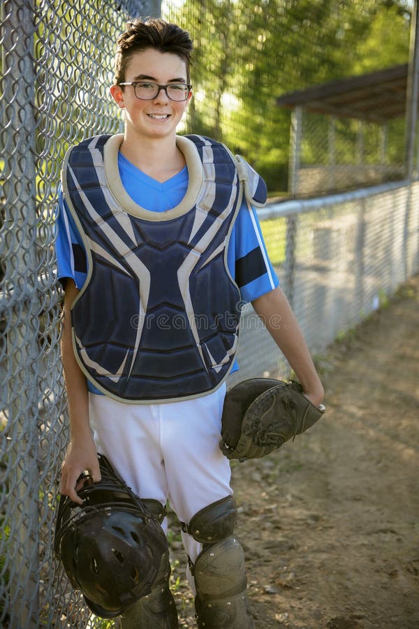A Children Baseball Catcher Players Standing on the Playground Stock ...